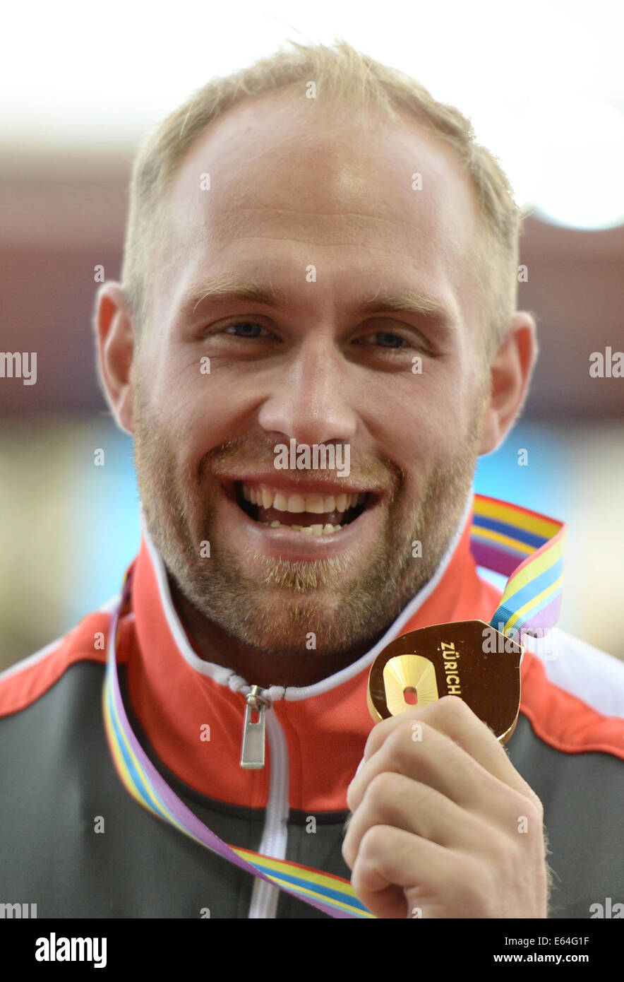 Zurich, Switzerland. 14th Aug, 2014. Discus throw winner Robert Harting ...