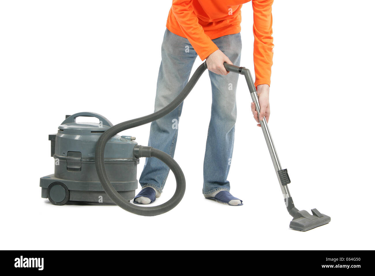 Man with vacuum cleaner isolated over white background Stock Photo - Alamy
