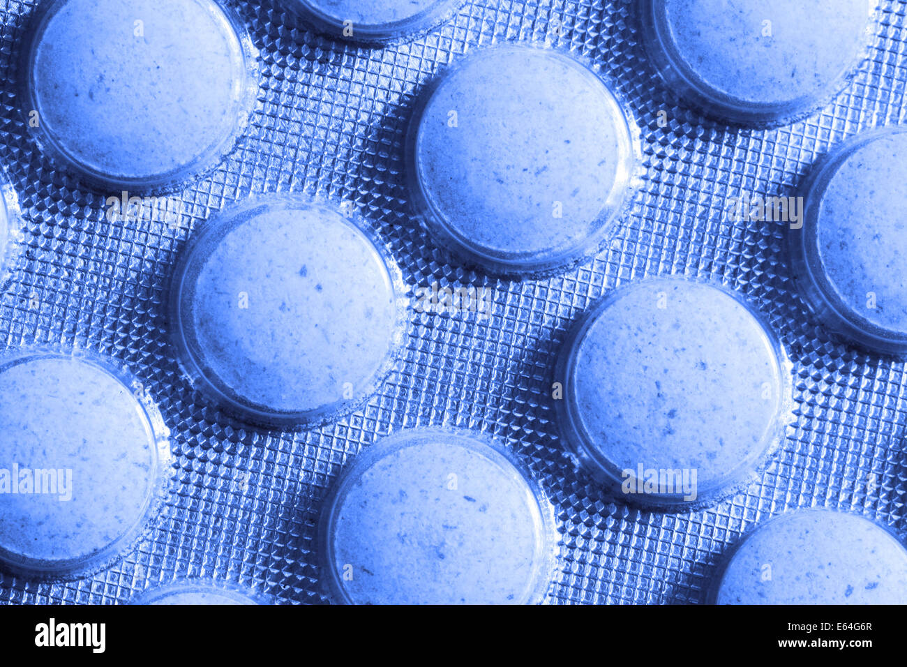 Pills pack macro toned in blue color Stock Photo - Alamy