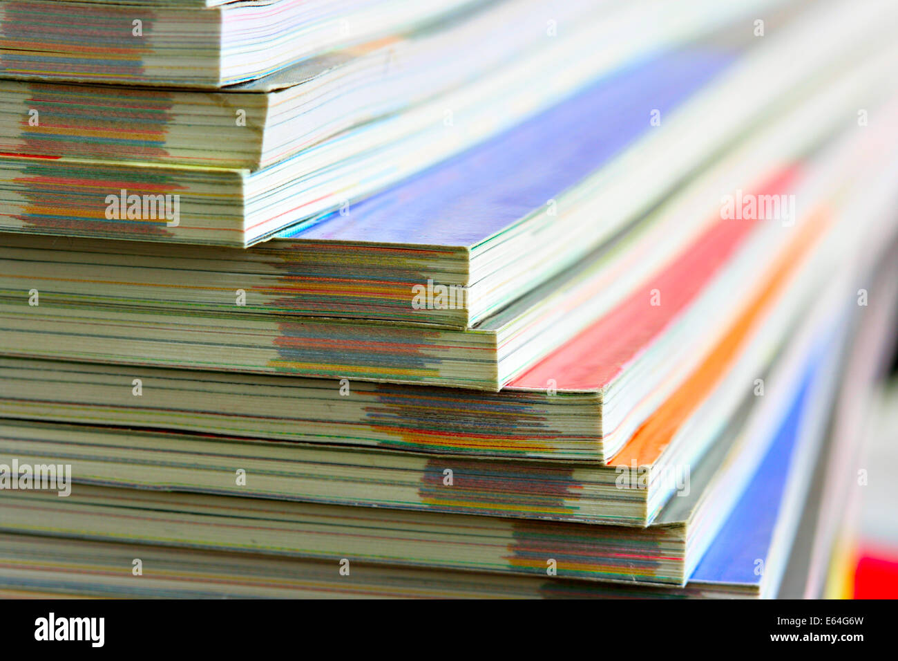 Colorful stacked magazines close-up Stock Photo - Alamy