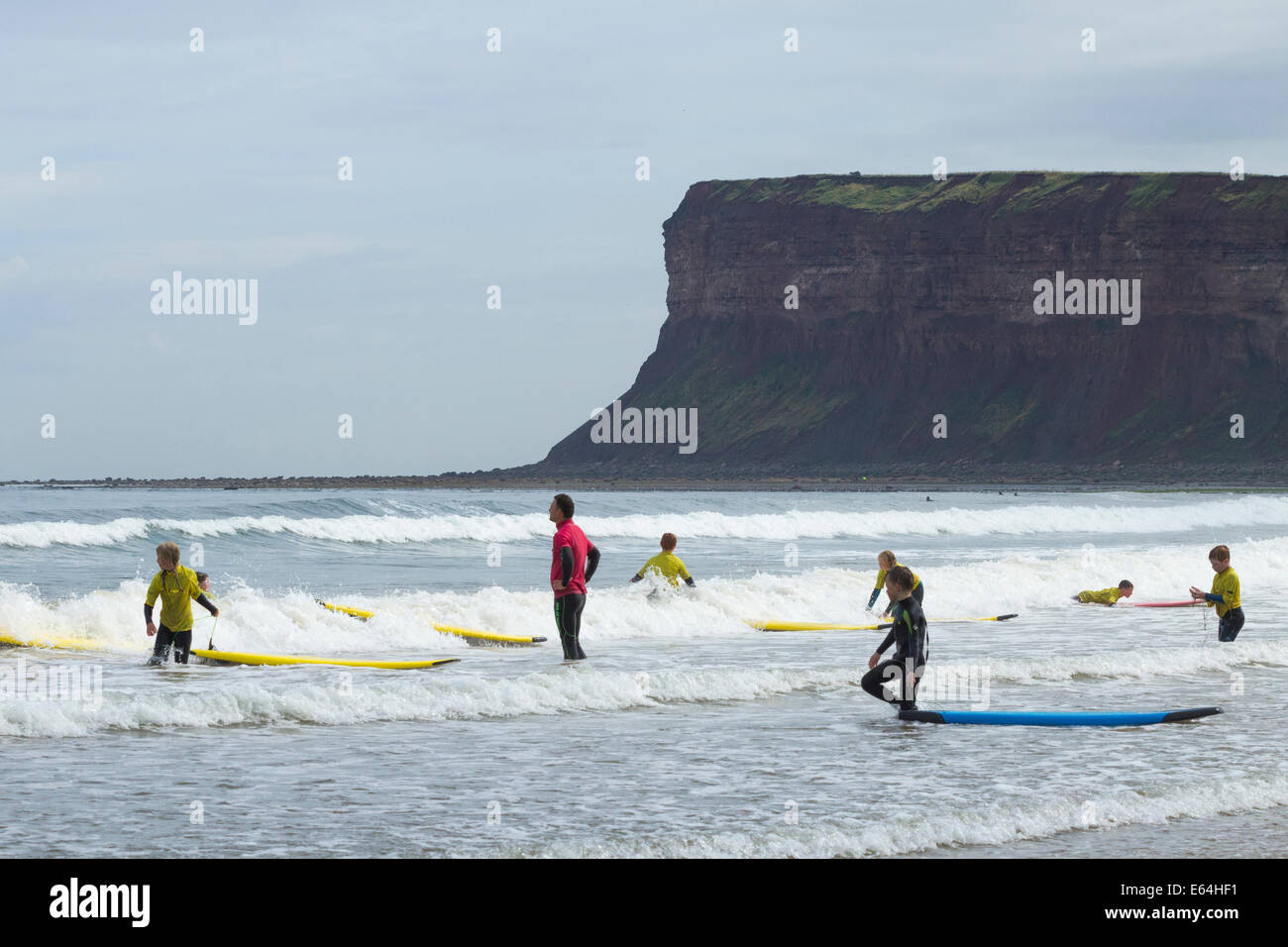 Surfing lesson children kids saltburn hi-res stock photography and ...