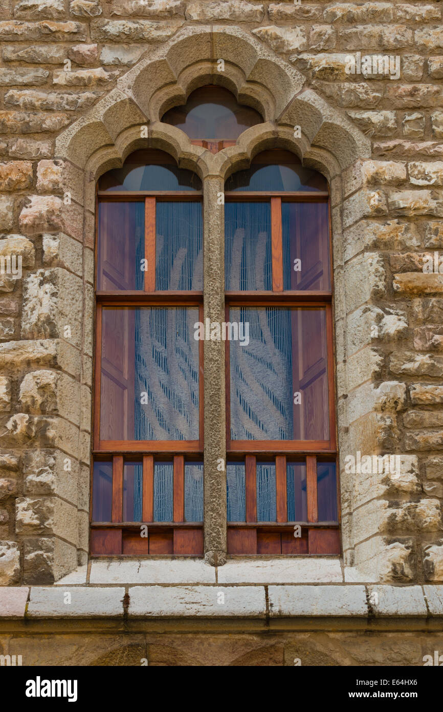 Fine piece of modernist art as window of a building in the center of ...