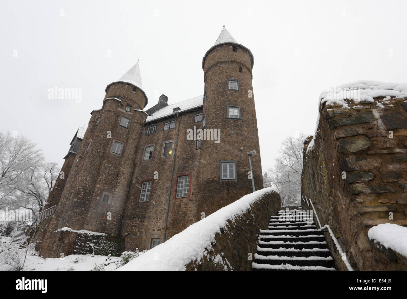 Snow-covered ancient castle in town Herborn, Hesse, Germany Stock Photo ...