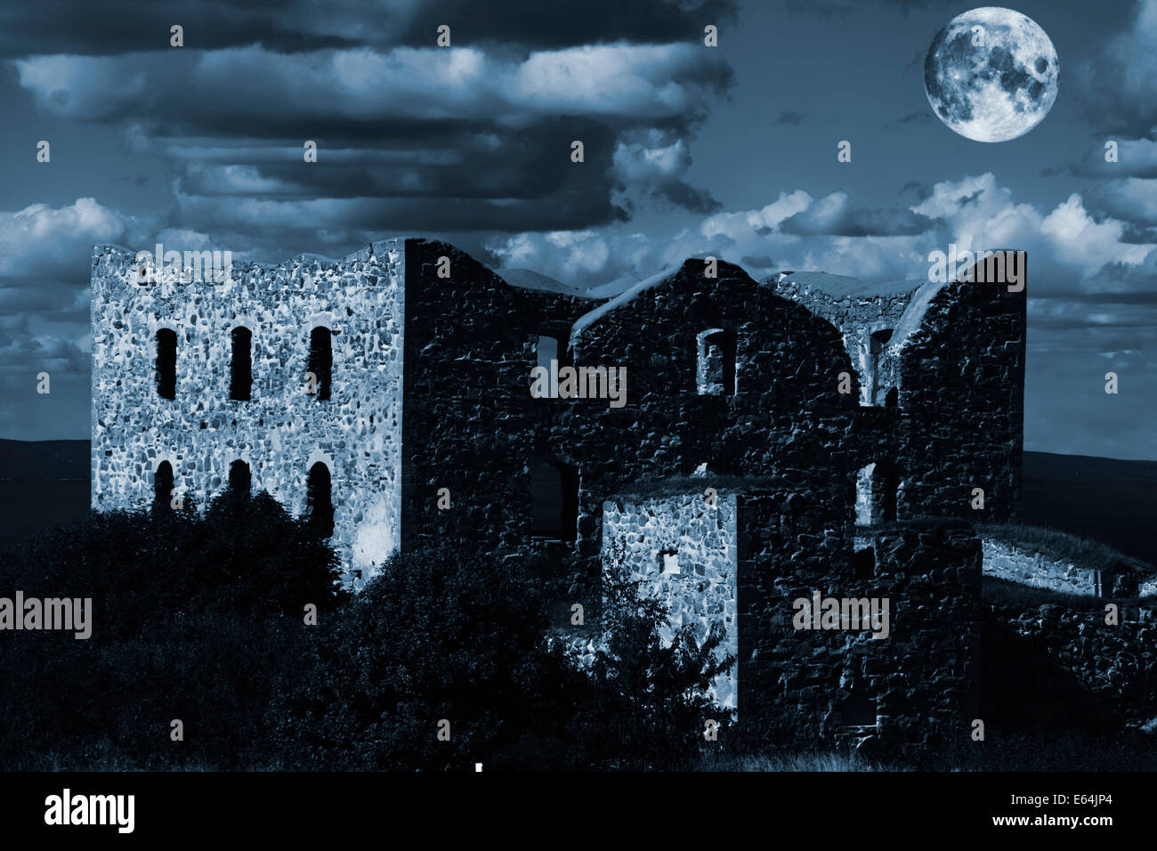 derelict castle ruin lit by a full-moom Stock Photo - Alamy
