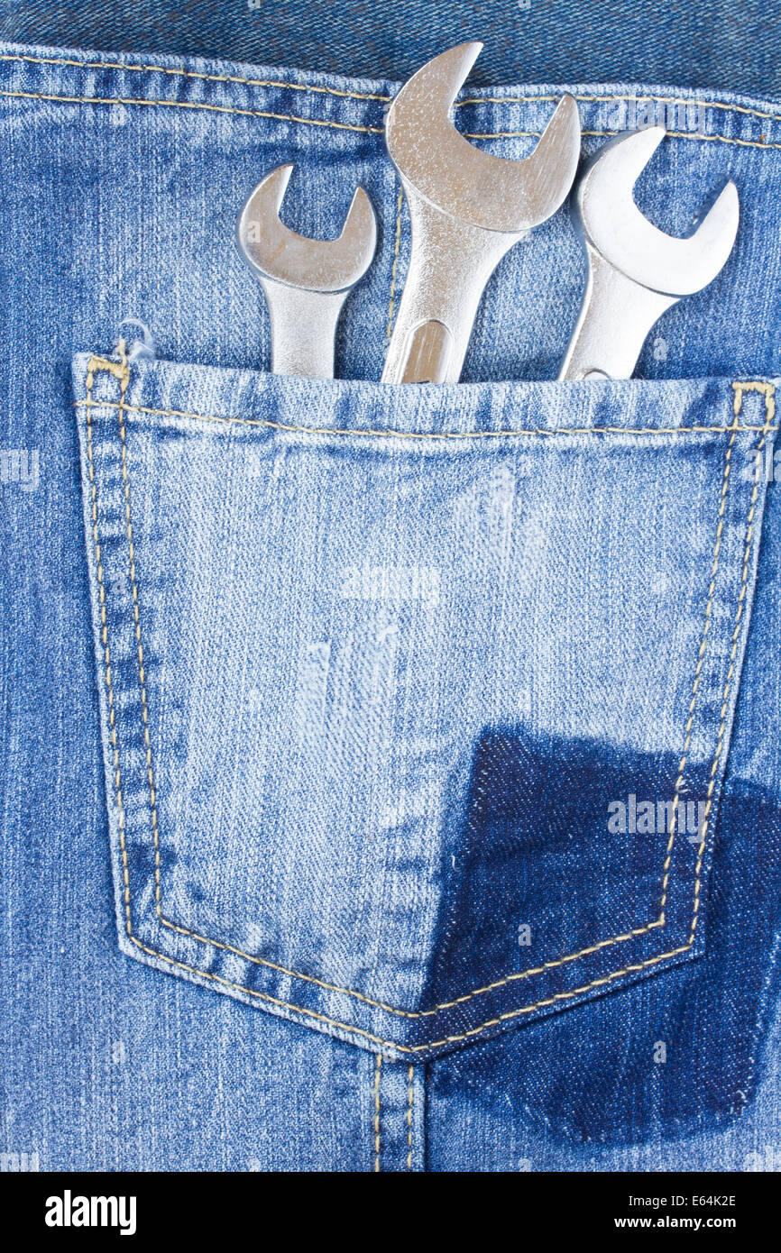 set of spanners in jeans pocket Stock Photo - Alamy