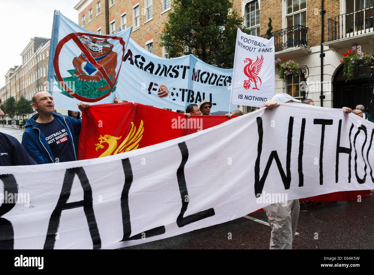 Football supporters demonstrate outside the Premier League and Football ...