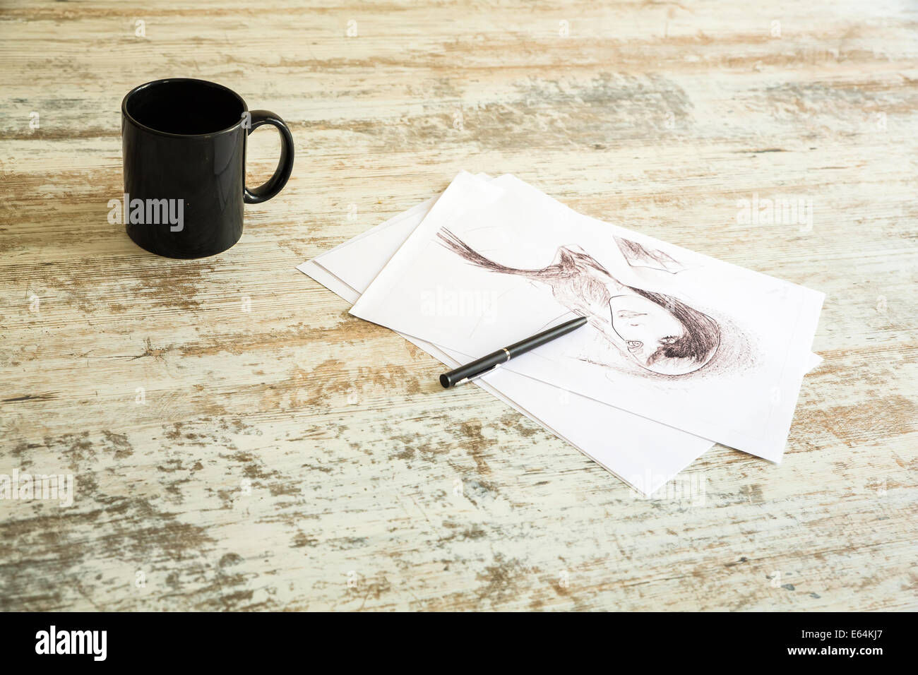 Drawing a sketch on the Table Stock Photo - Alamy