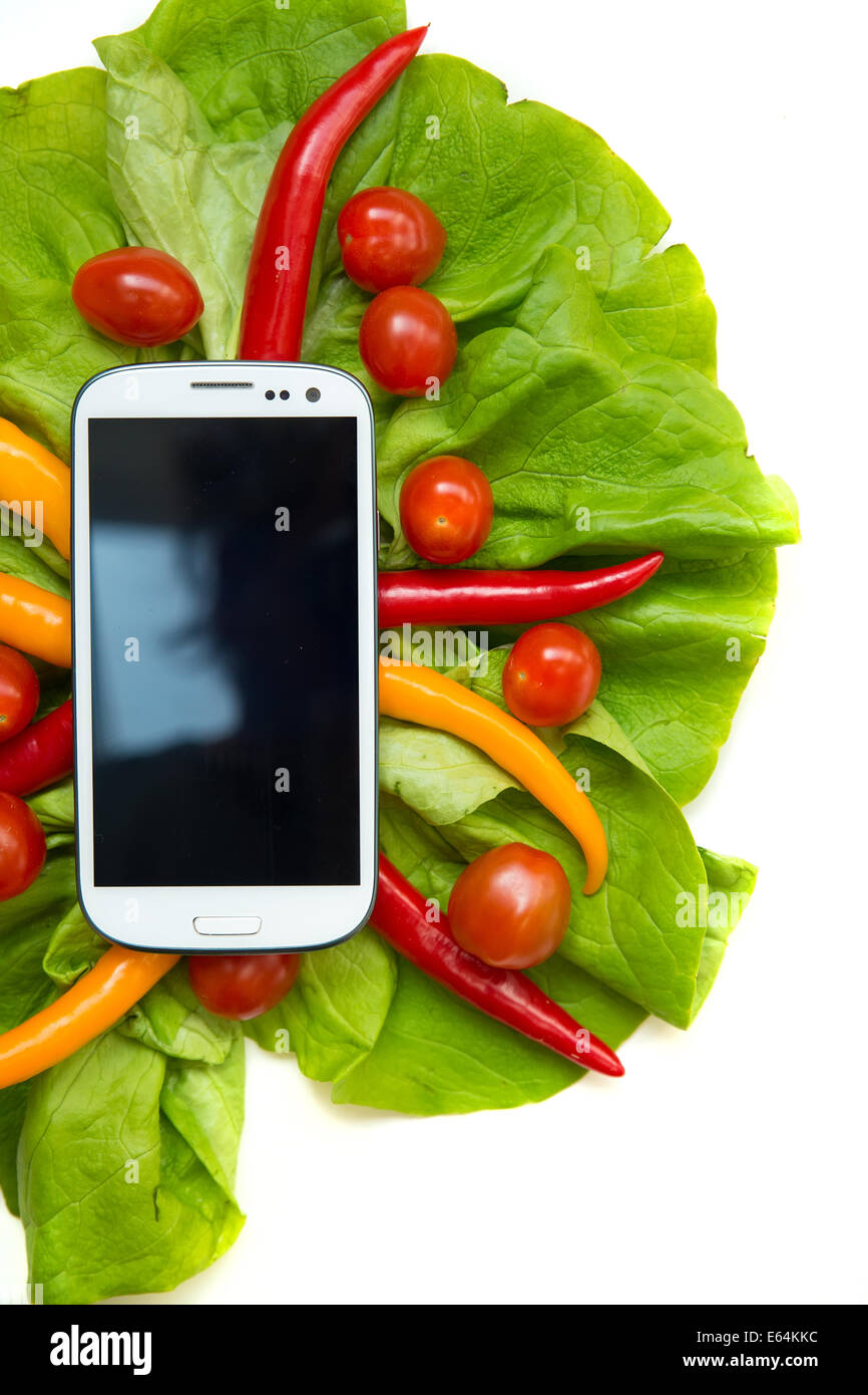 Various vegetables with a Smartphone Stock Photo - Alamy