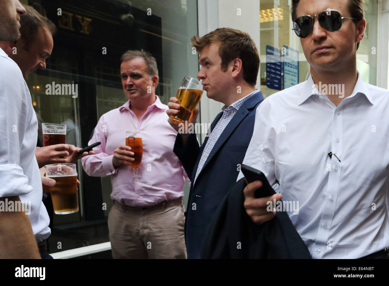 a office workers in the city of london, drinking beer, UK, London Photo ...
