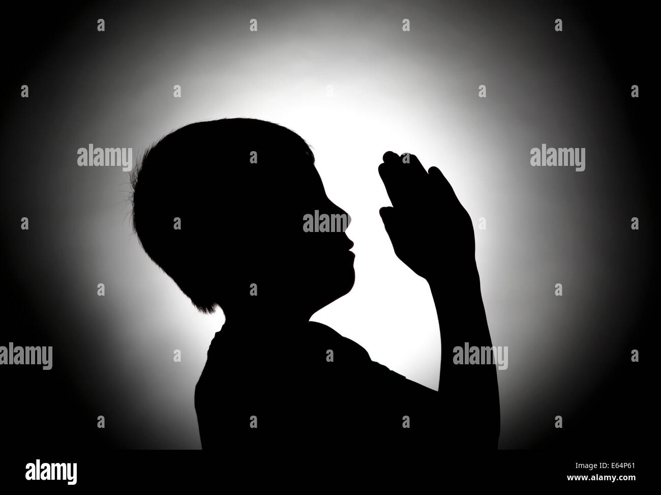 Praying to heaven Stock Photo - Alamy