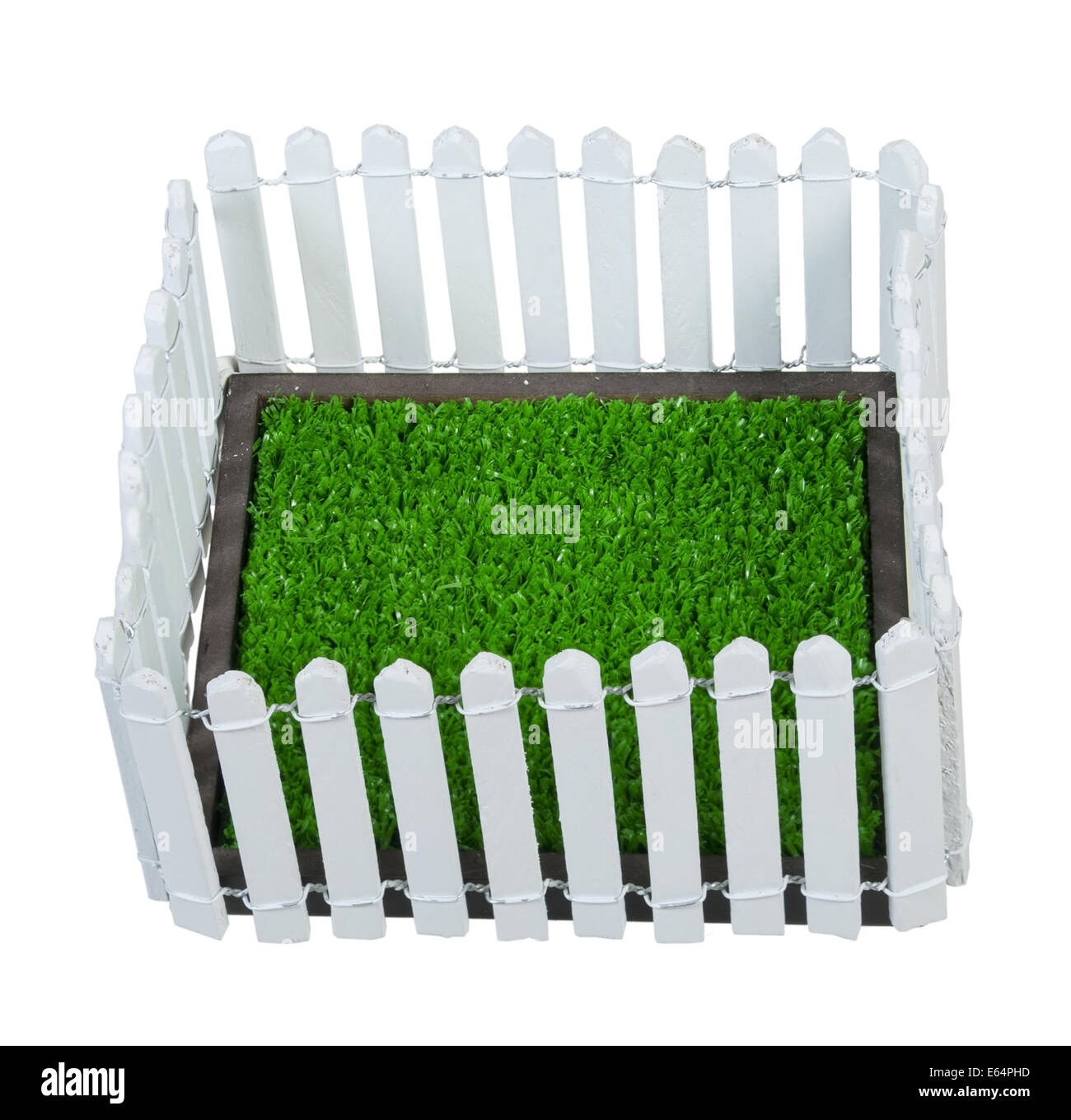 Enclosed green grass yard by a white picket fence - path included Stock ...