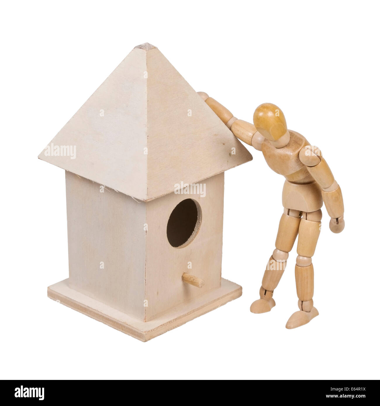 Person peering into a birdhouse with Roof and a Peg for a Porch - path ...