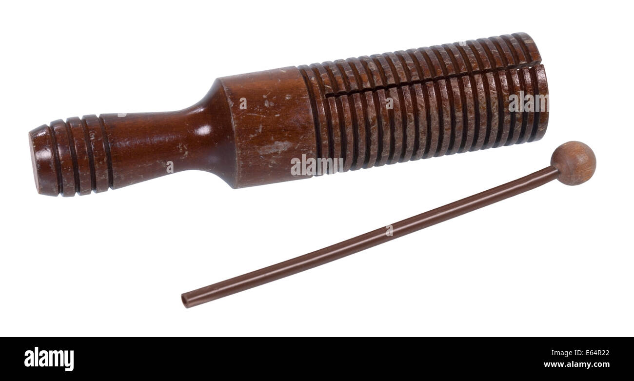 Wooden rhythm stick with parallel notches which are rubbed with a stick ...