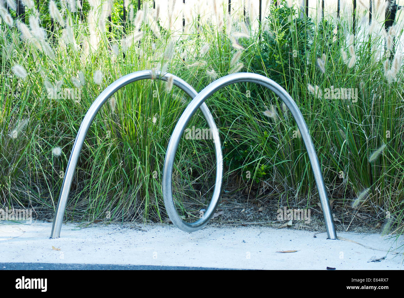 Bicycle rack in a Sydney park, shaped like the letter 'M' Stock Photo ...