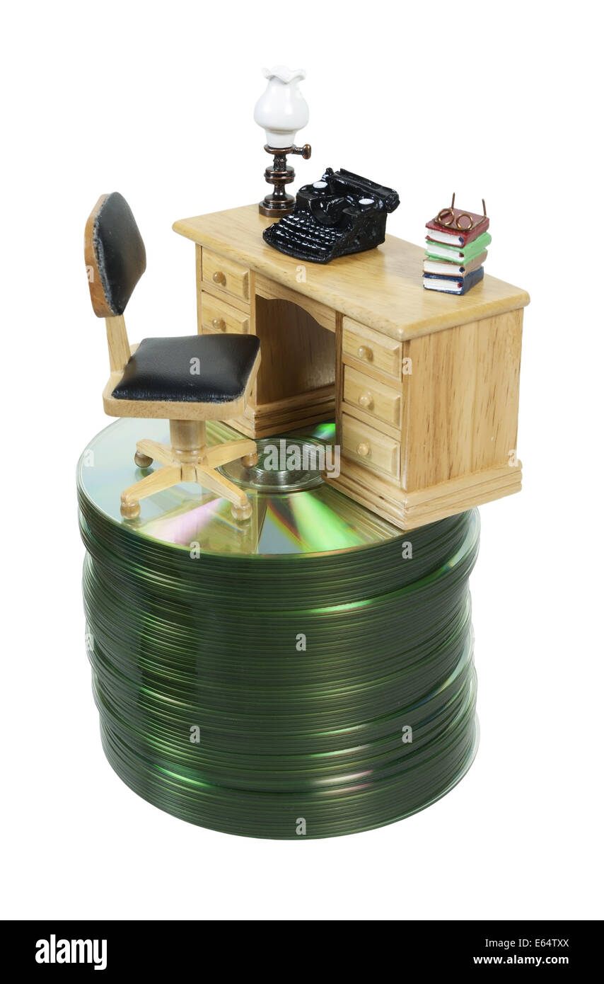 Retro typewriter on wooden desk on a stack of computer disks - path ...