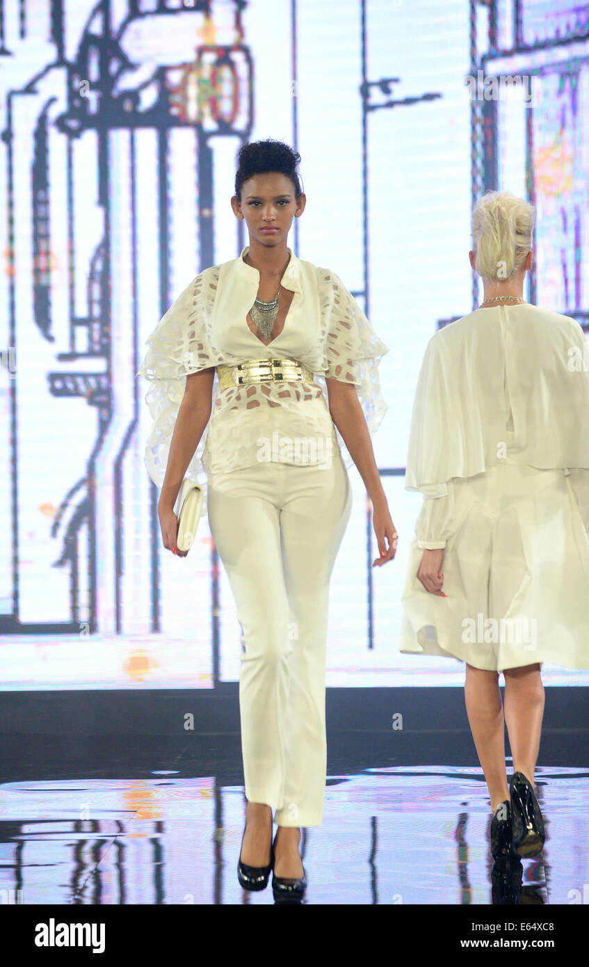 Guangzhou, China's Guangdong Province. 15th Aug, 2014. Models display ...