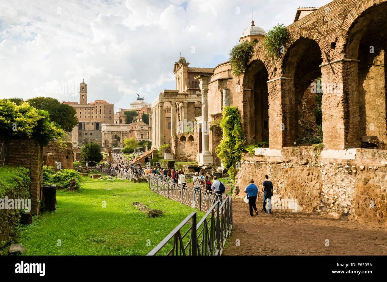 Tourists in Via Sacra, Maxentius Basilica, Romulus Temple, Temple of ...