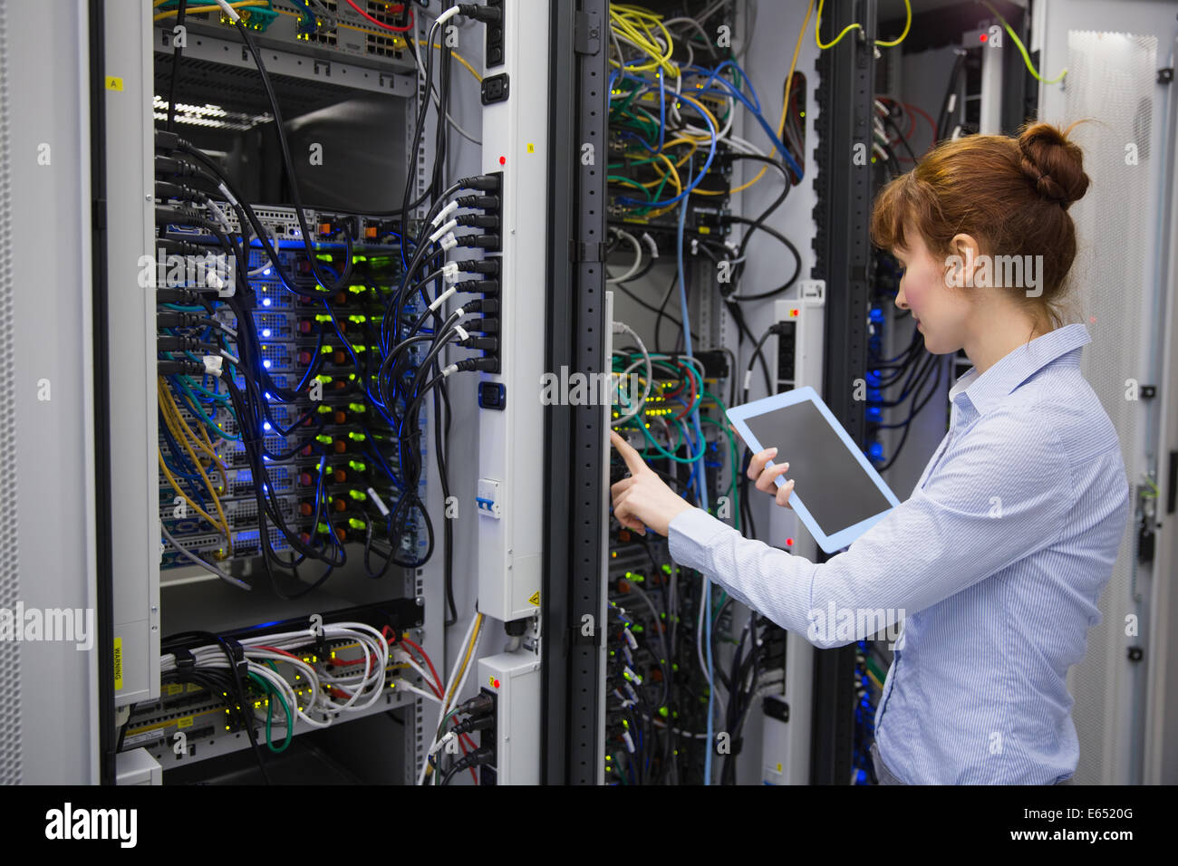 Technician using tablet analysing hi-res stock photography and images ...