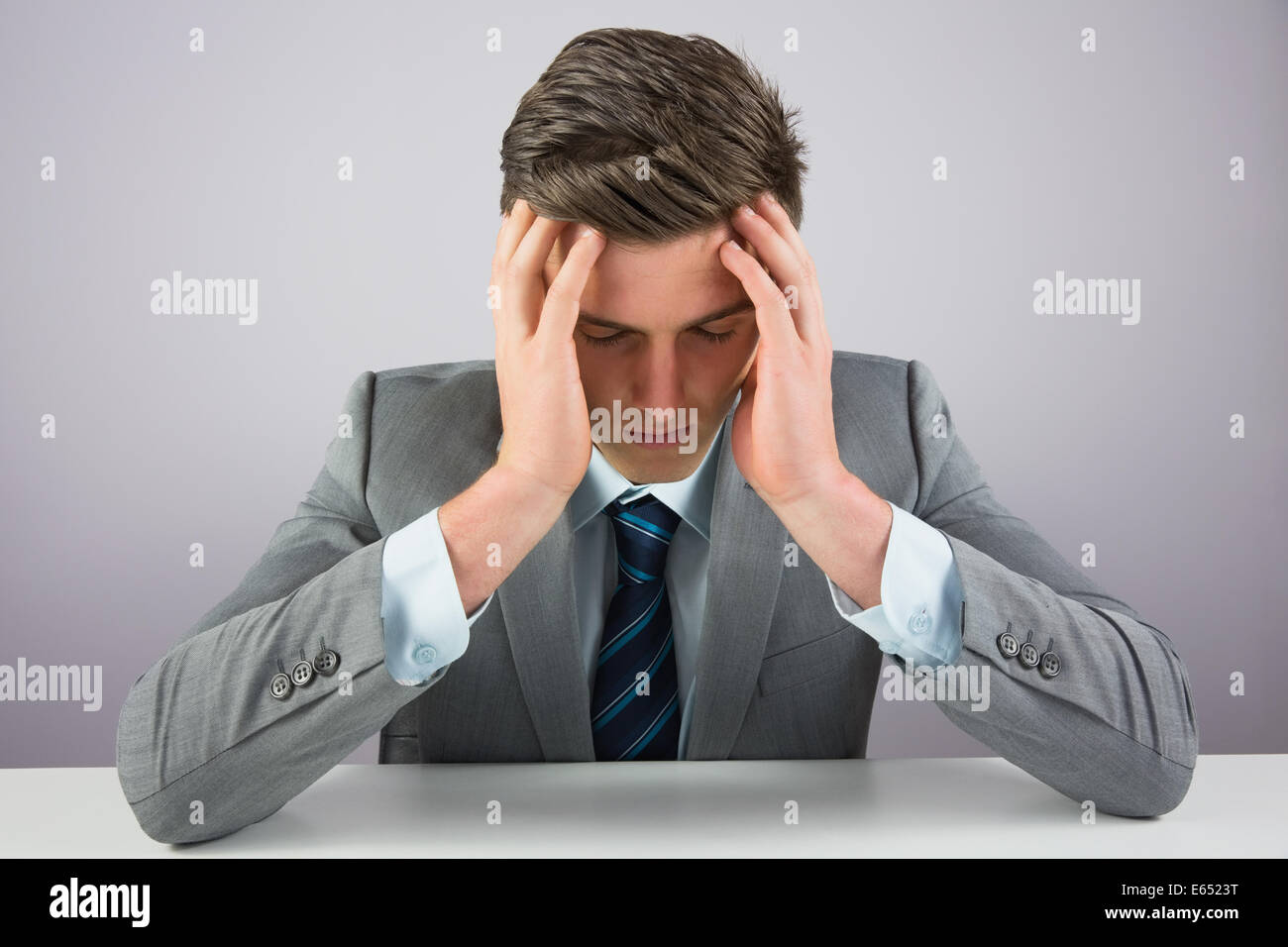 Man sitting desk stressed anxious hi-res stock photography and images ...