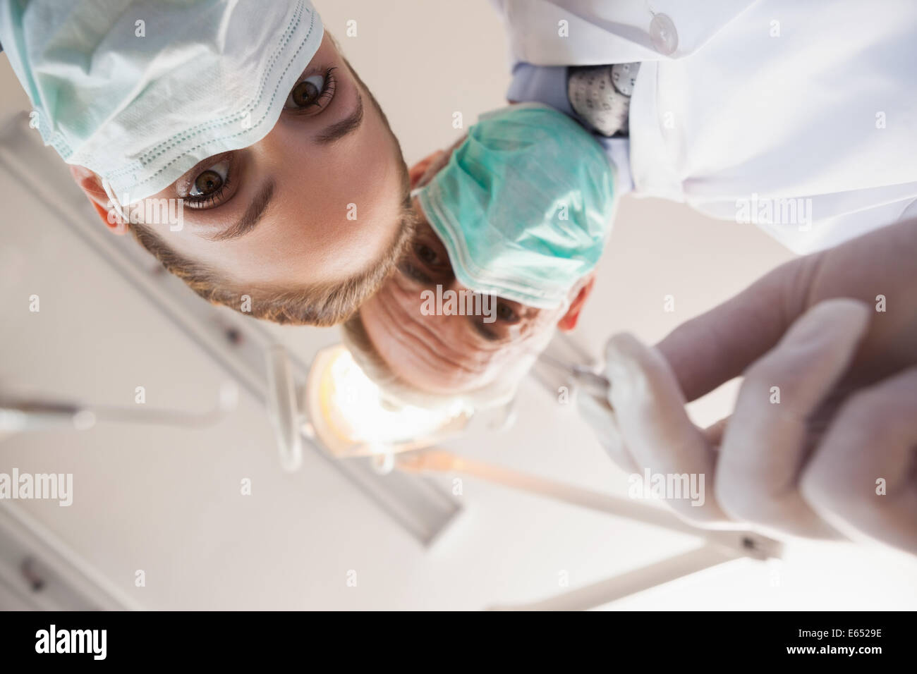 Leaning over chair hi-res stock photography and images - Alamy