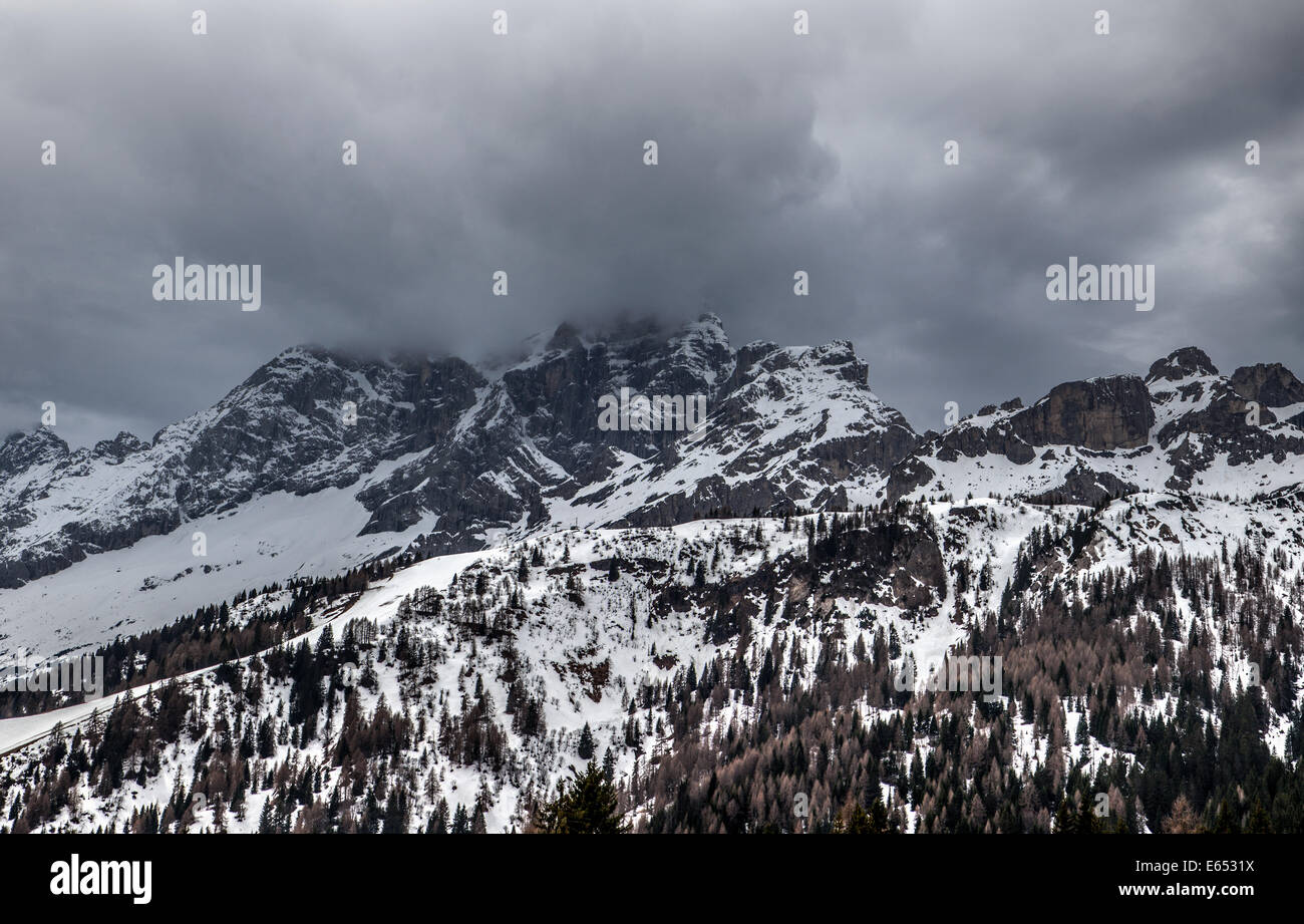 Panorama of cloudy spring weather in Dolomites mountains. Italian ...