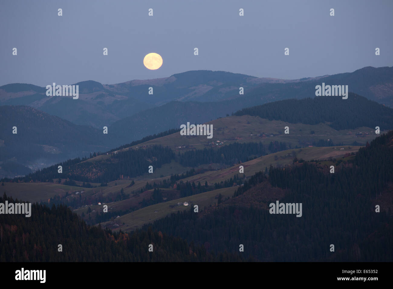 Full moon over mountain village hi-res stock photography and images - Alamy