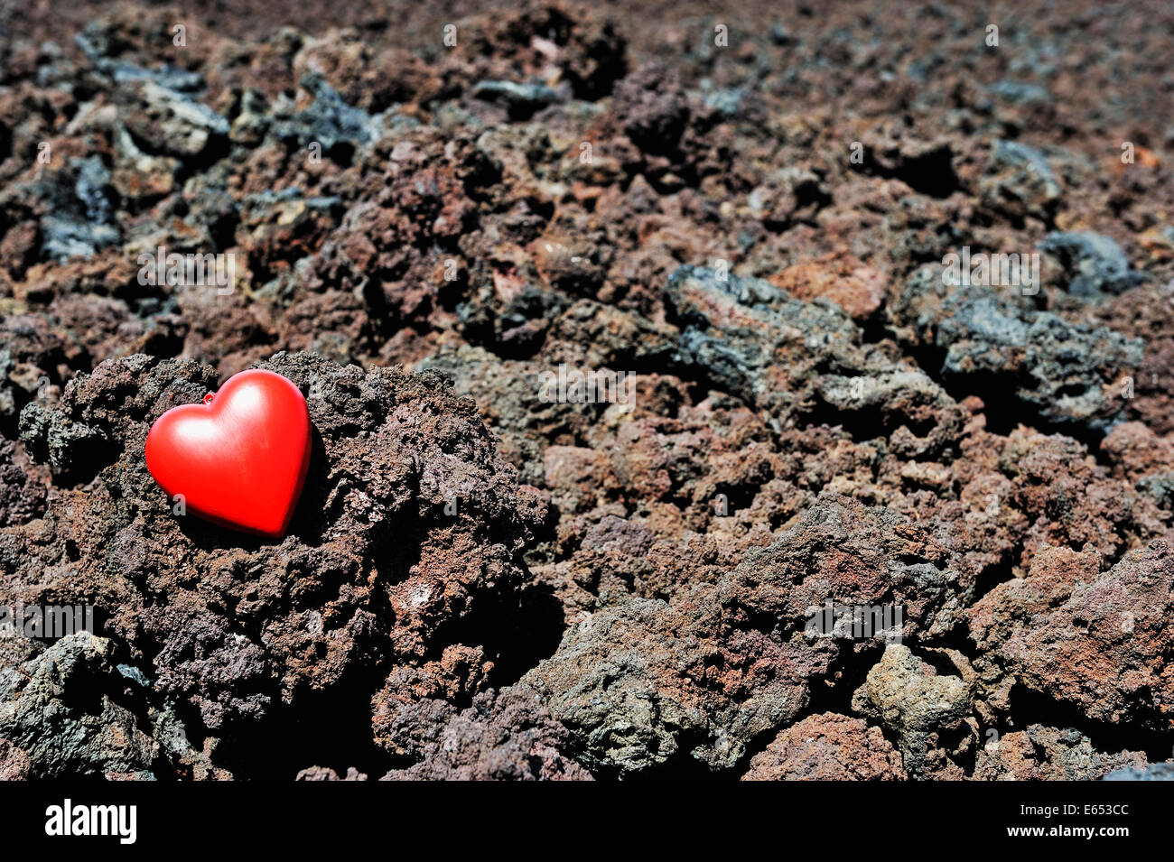 Heart shape on cold lava rocks Stock Photo - Alamy
