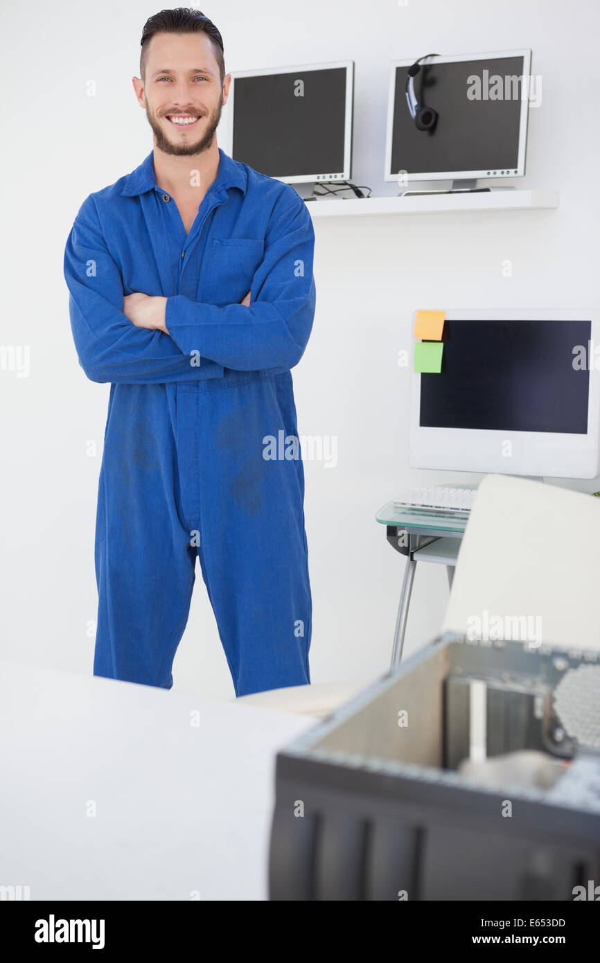 Computer engineer standing and smiling at camera Stock Photo - Alamy