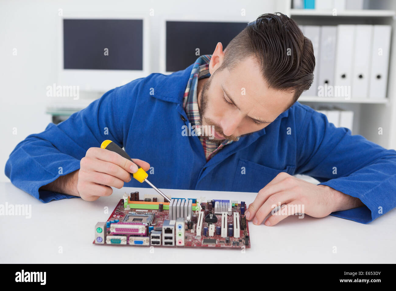 Engineer looking problem on motherboard hi-res stock photography and ...