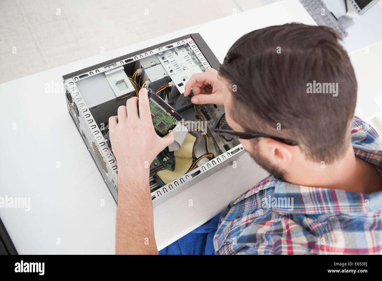 Computer engineer working on broken cpu Stock Photo - Alamy