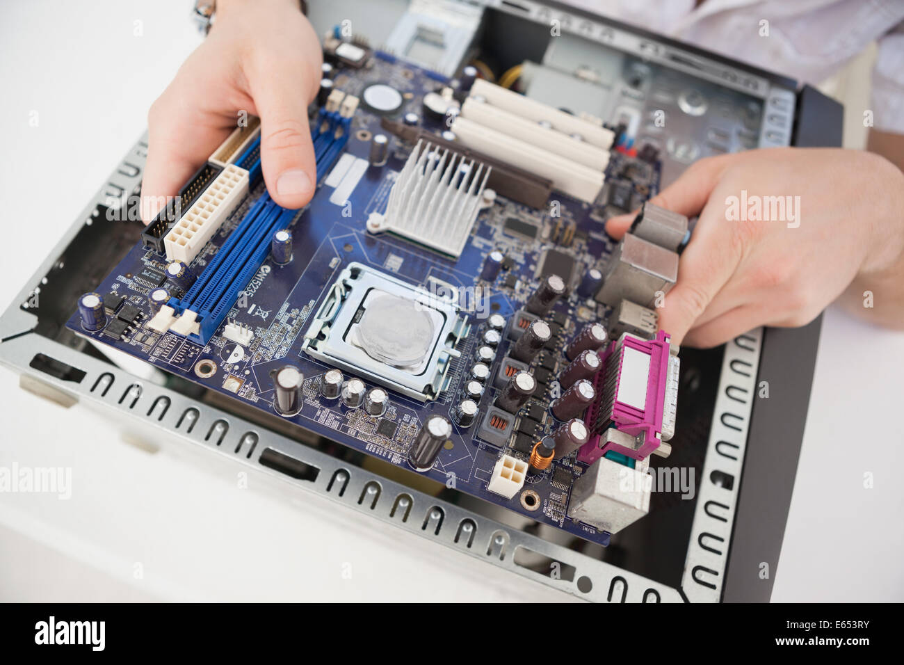 Computer engineer working on broken cpu Stock Photo - Alamy