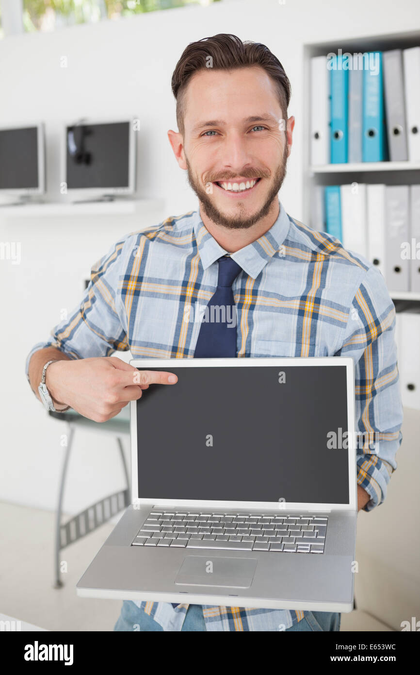Casual man laptop pointing camera hi-res stock photography and images ...