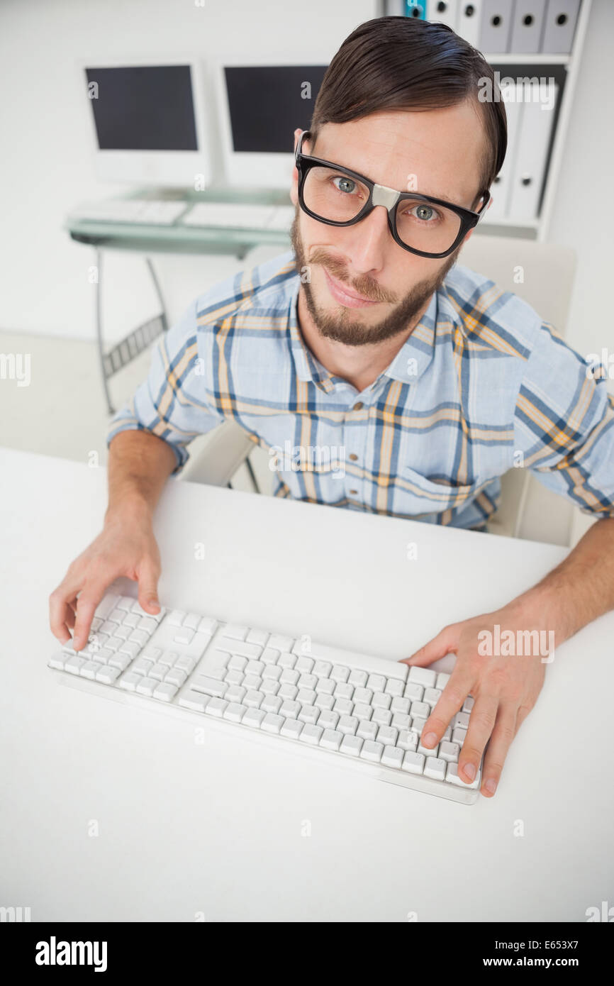 Nerdy businessman working on computer Stock Photo - Alamy