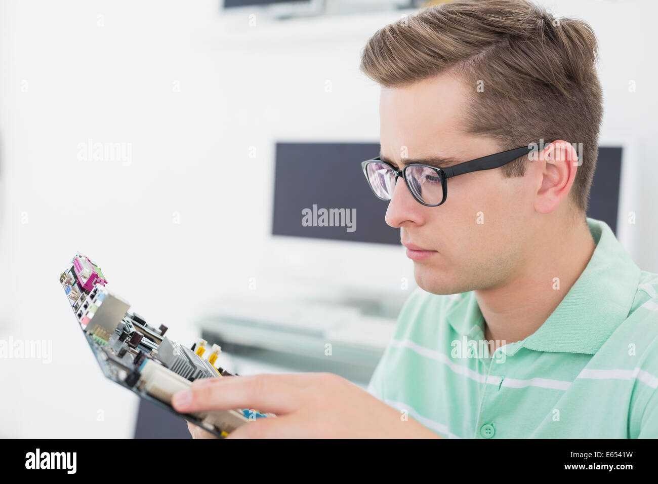 Technician working on broken cpu Stock Photo - Alamy
