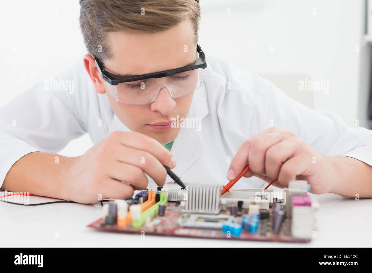 Technician working on broken cpu with soldering iron Stock Photo - Alamy