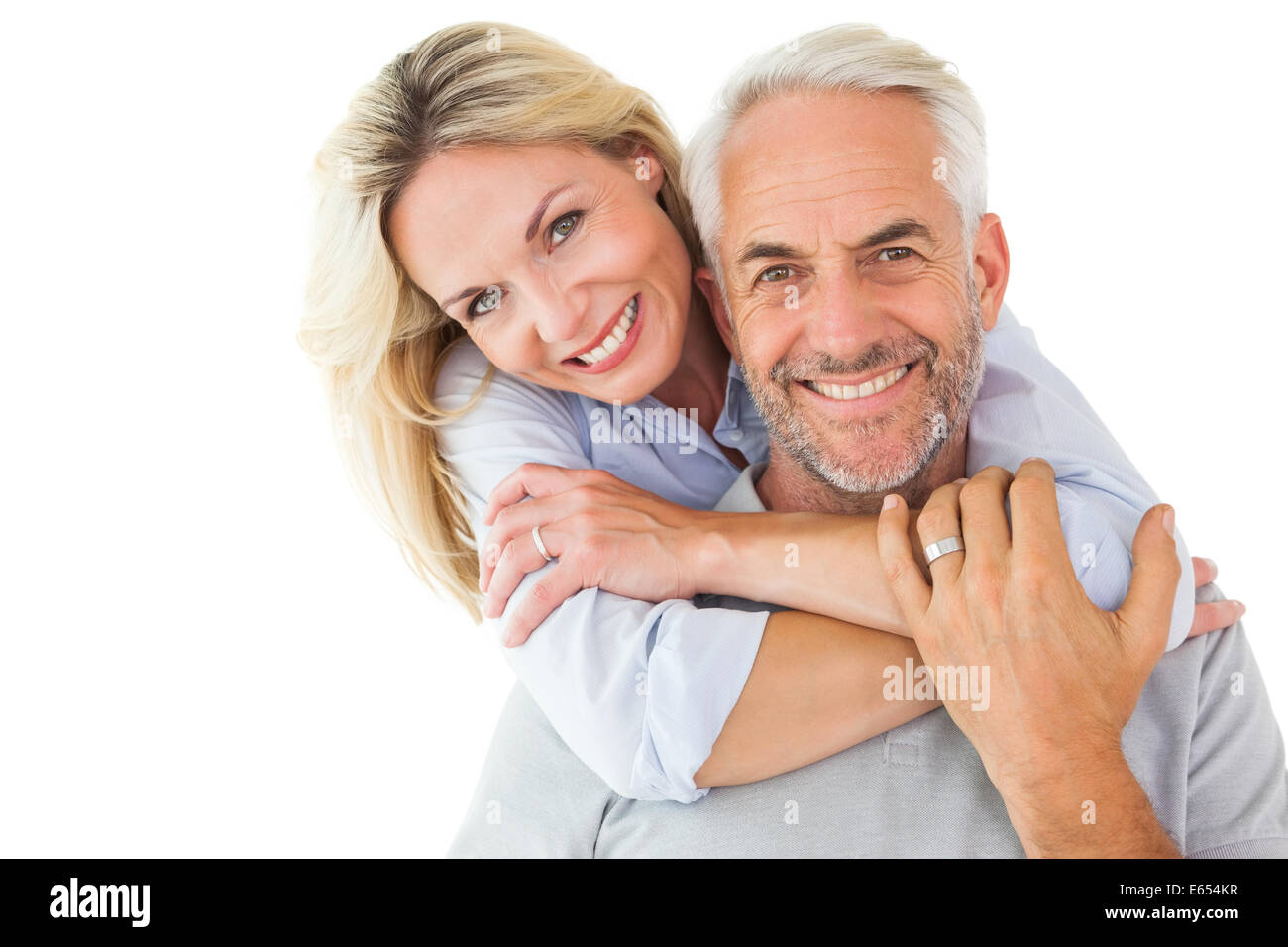 Happy couple standing and hugging Stock Photo - Alamy