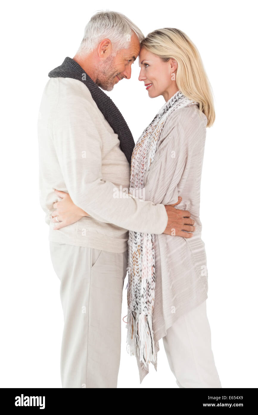 Happy couple standing and hugging Stock Photo - Alamy