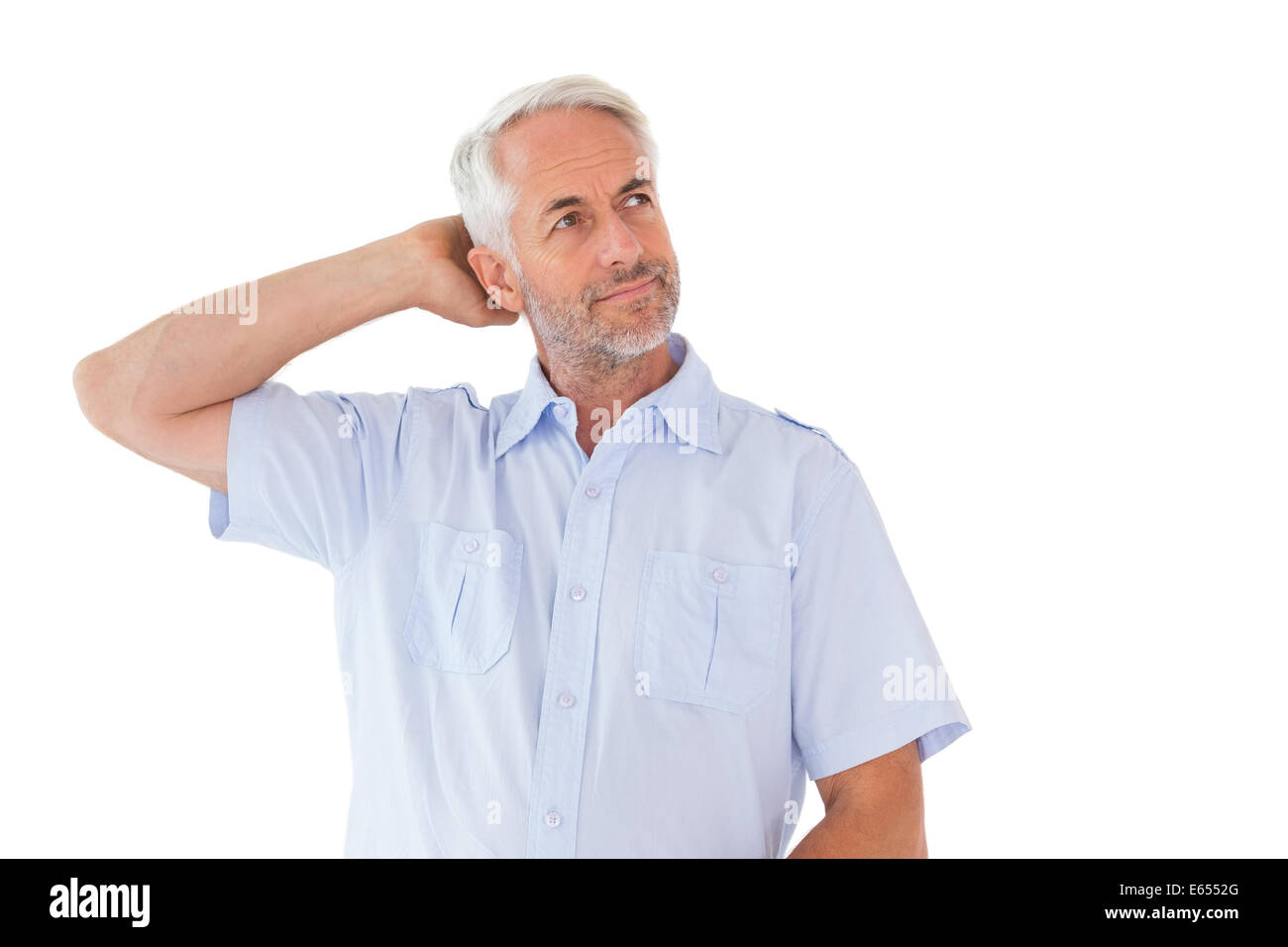 Thinking man posing with hand behind head Stock Photo - Alamy