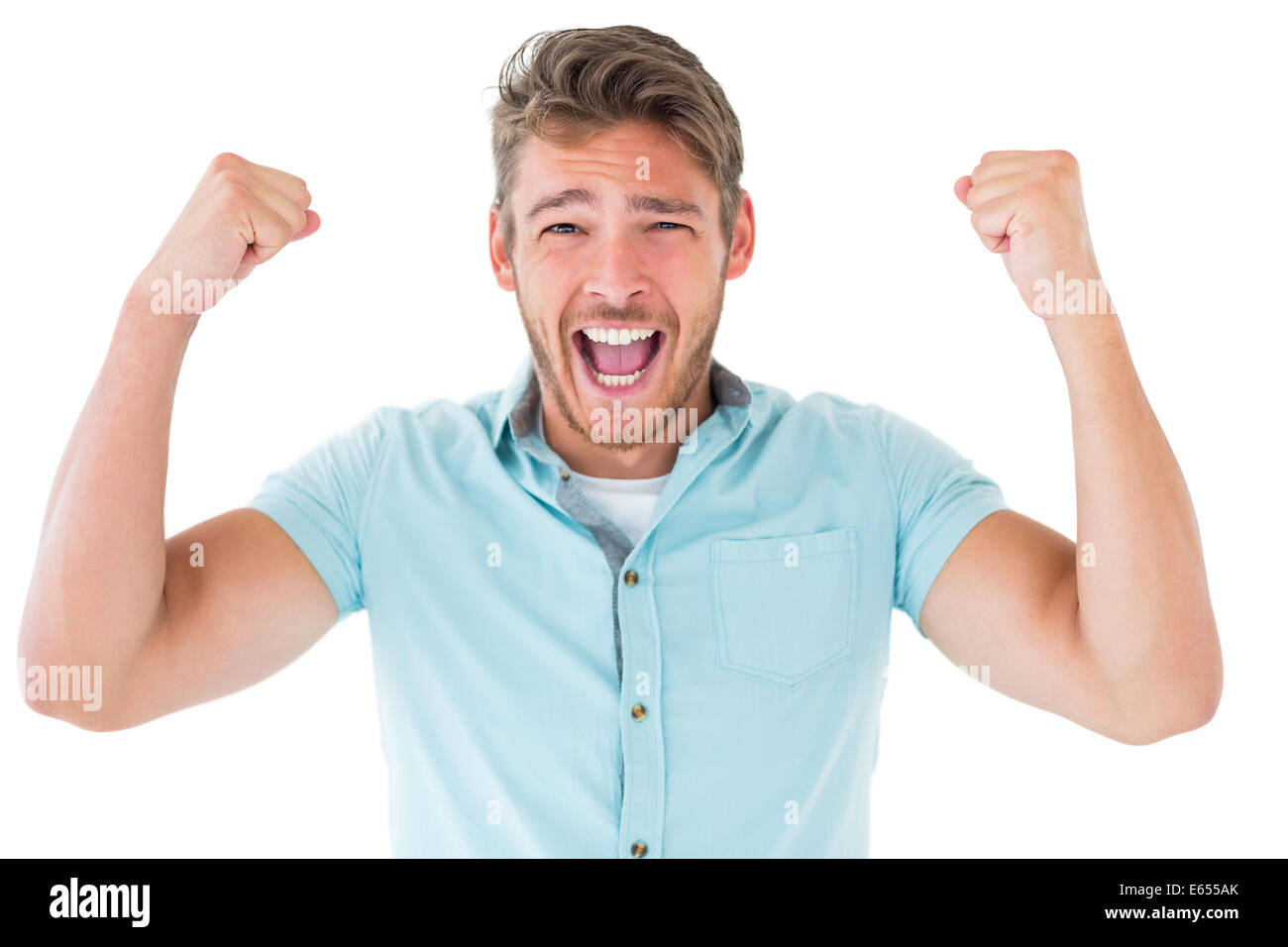 Handsome young man cheering at camera Stock Photo - Alamy