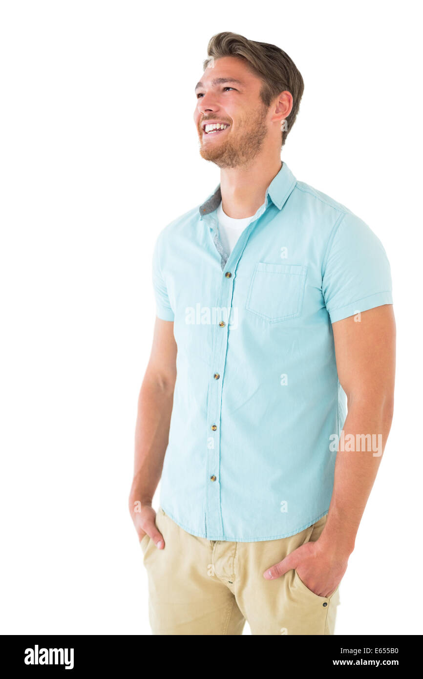 Handsome young man posing with hands in pockets Stock Photo - Alamy