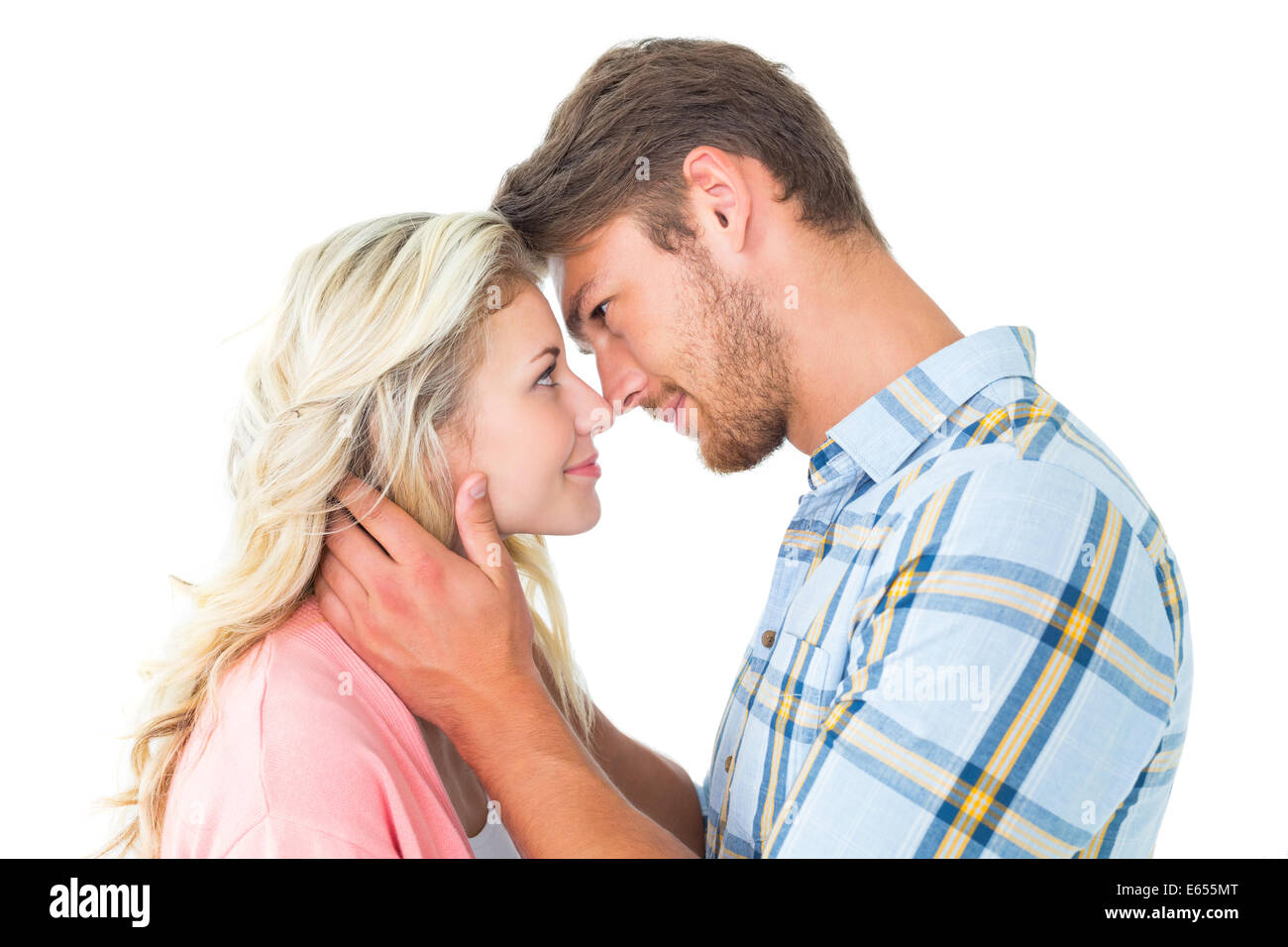 Attractive couple smiling at each other Stock Photo - Alamy