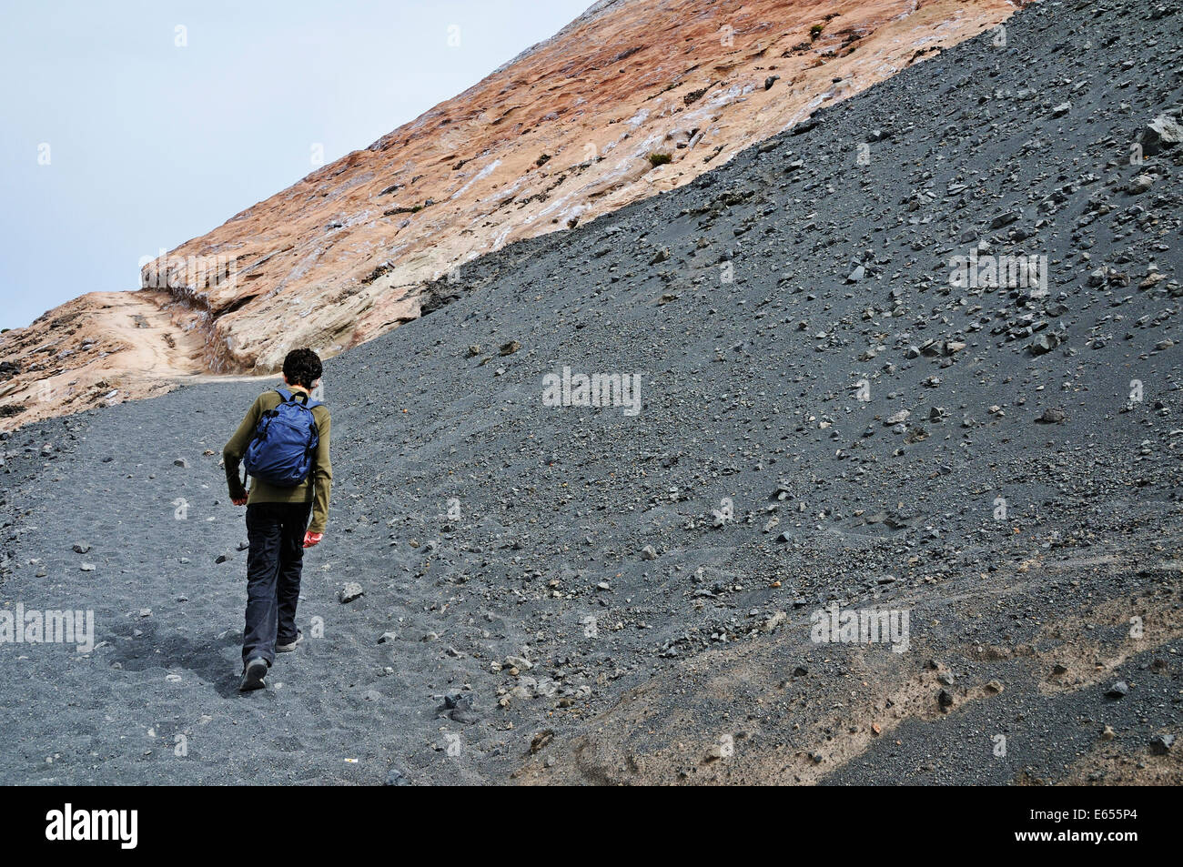 Teen boy hiking on a volcano, Vulcano Island in the Tyrrhenian Sea ...