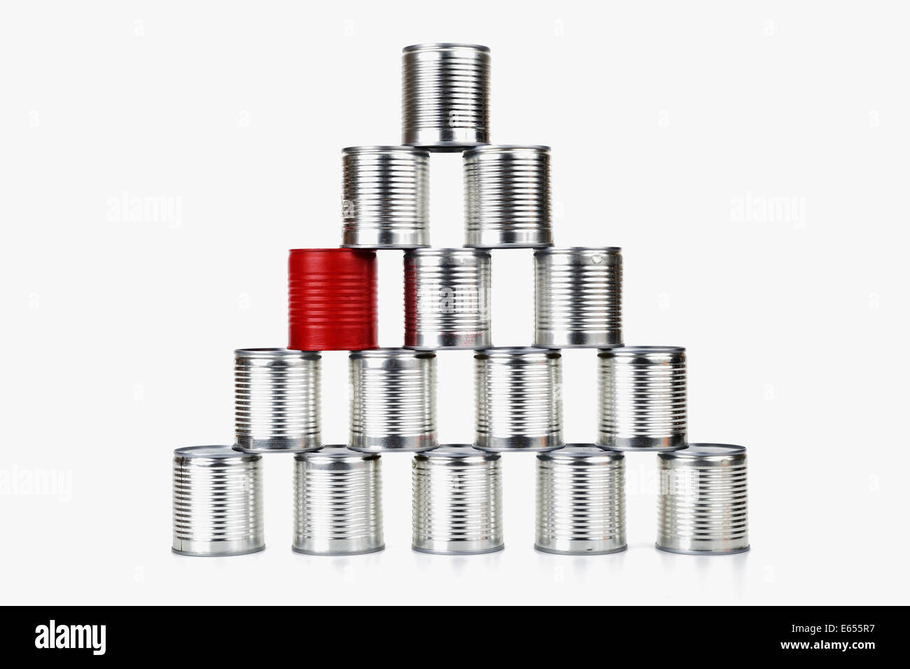 Red tin can inside a pyramid - difference concept - on white background ...