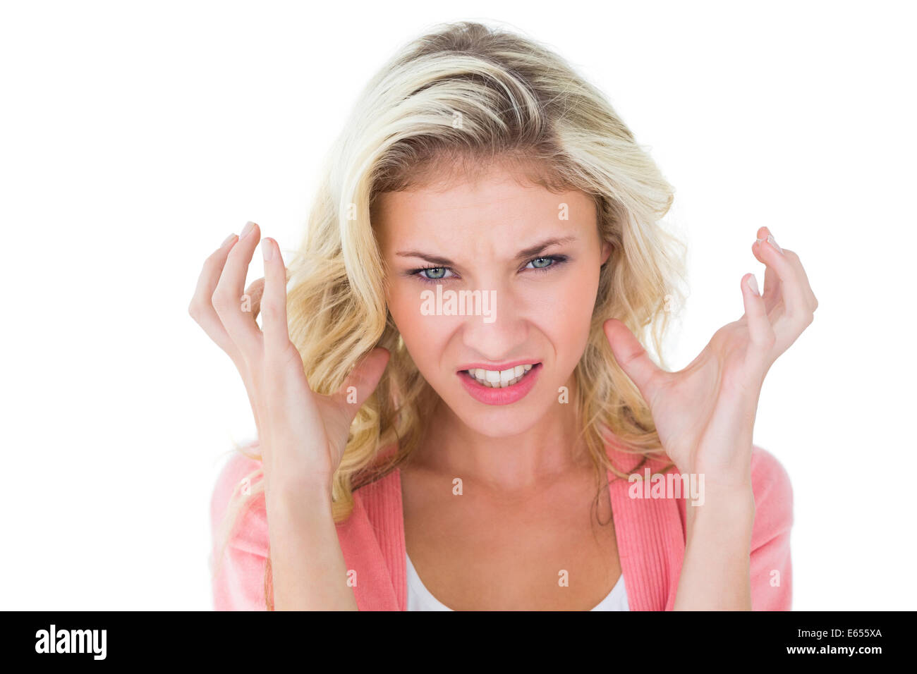 Pretty young blonde feeling angry Stock Photo - Alamy