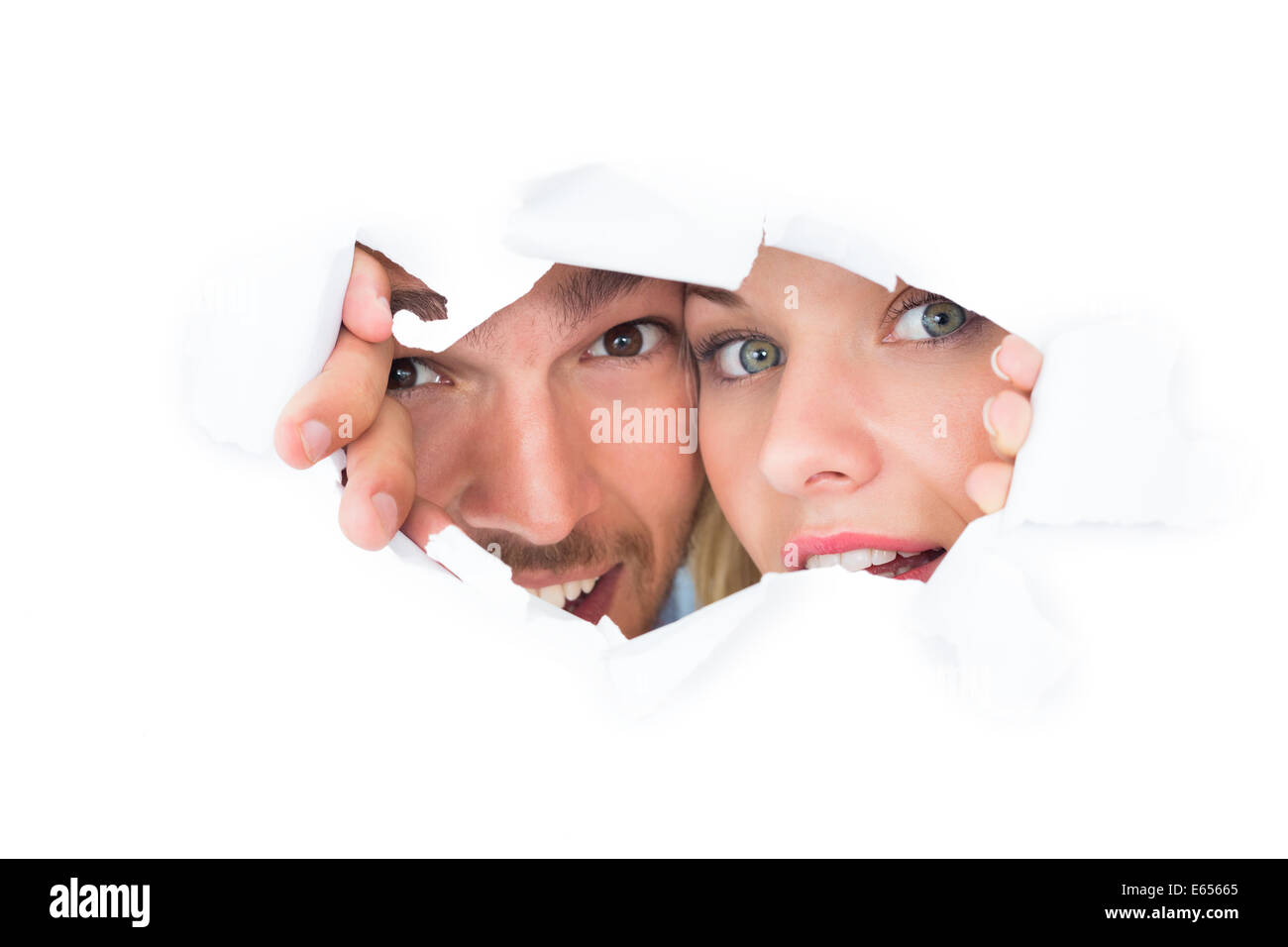 Man looking through ripped paper hole Cut Out Stock Images & Pictures ...