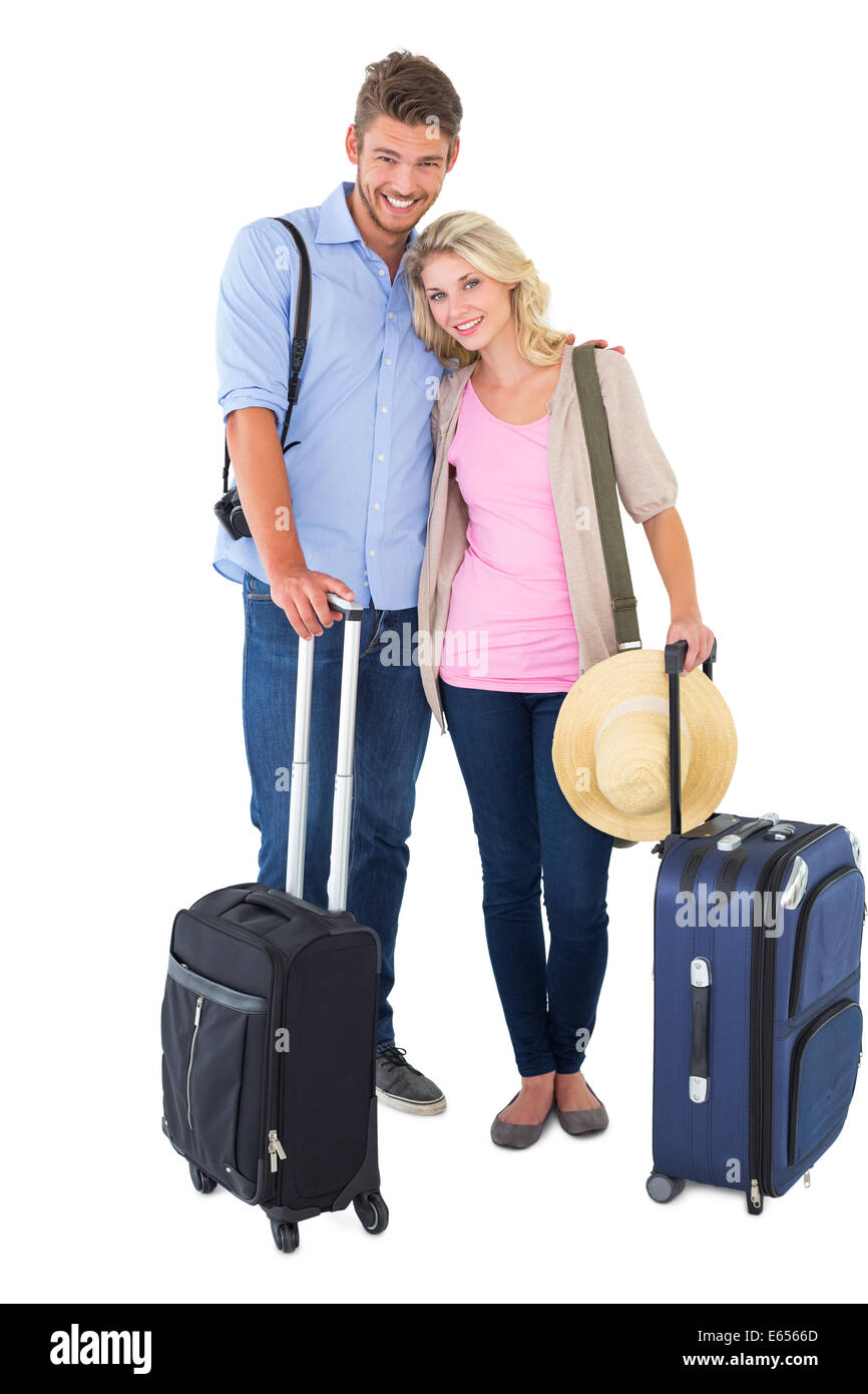 Attractive young couple ready to go on vacation Stock Photo - Alamy