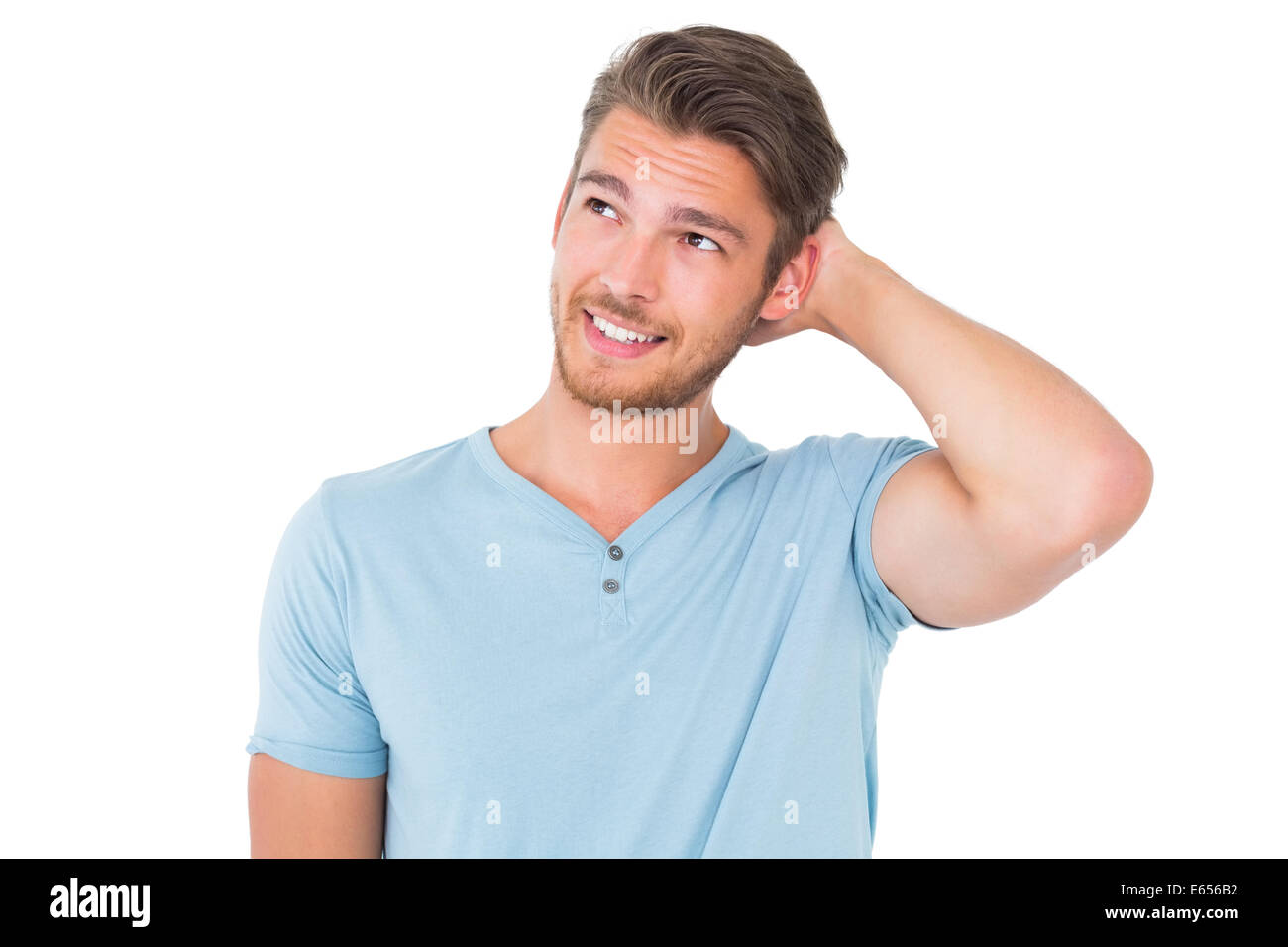 Young man posing with hands on head Stock Photo - Alamy