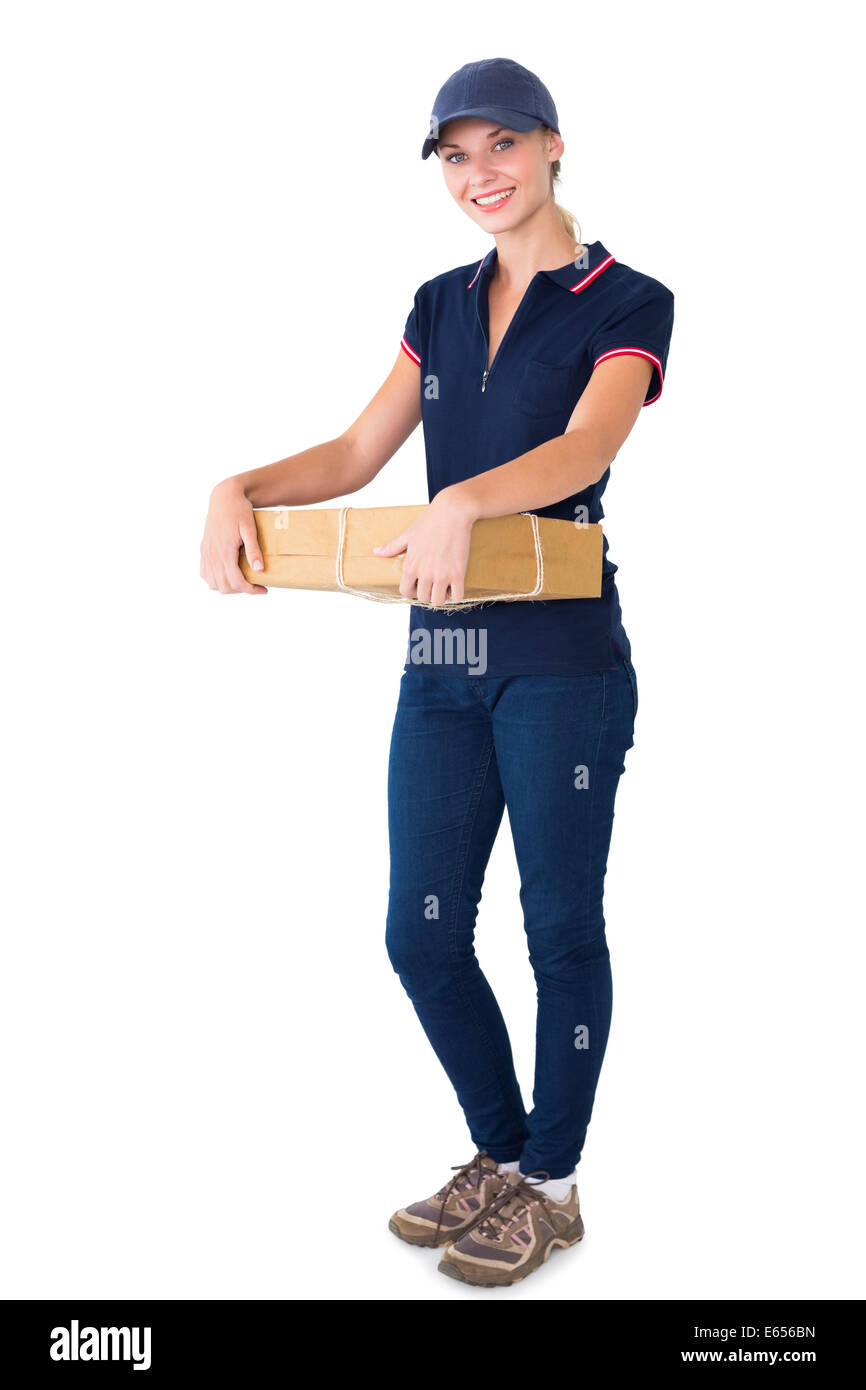 Happy delivery woman holding cardboard box Stock Photo - Alamy