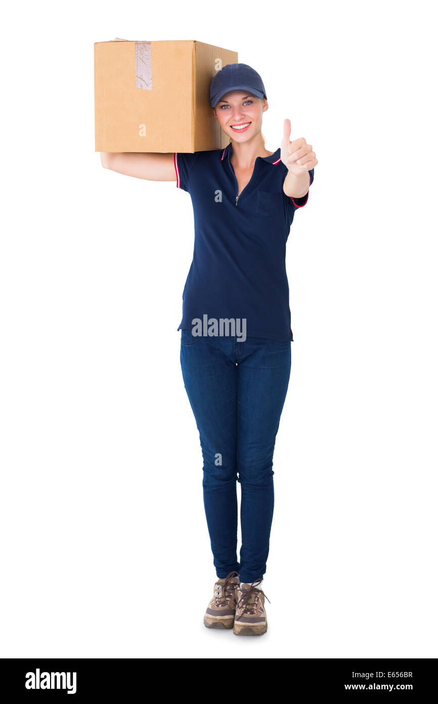 Woman smiling holding thumbs up Cut Out Stock Images & Pictures - Alamy