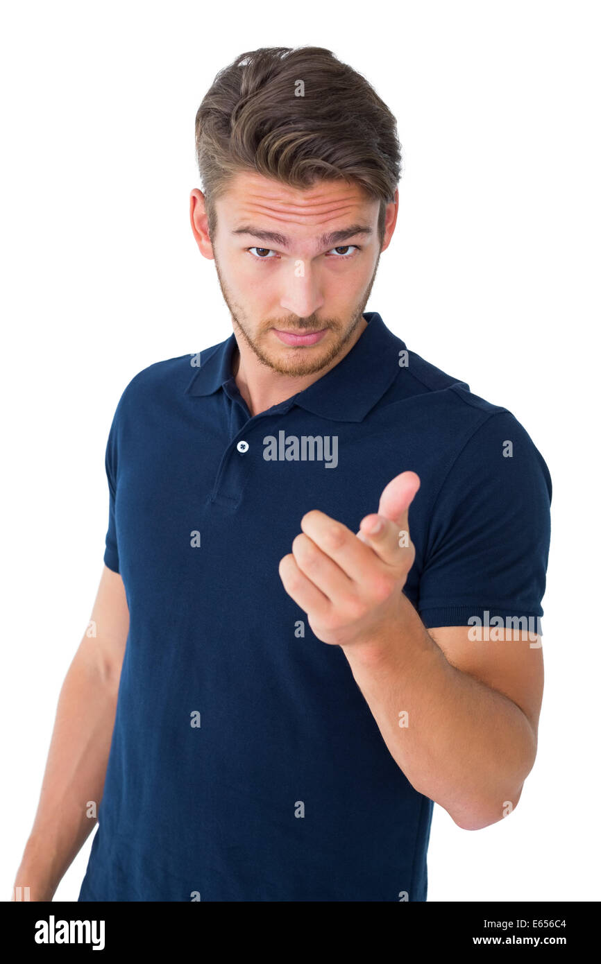 Handsome young man pointing at camera Stock Photo - Alamy